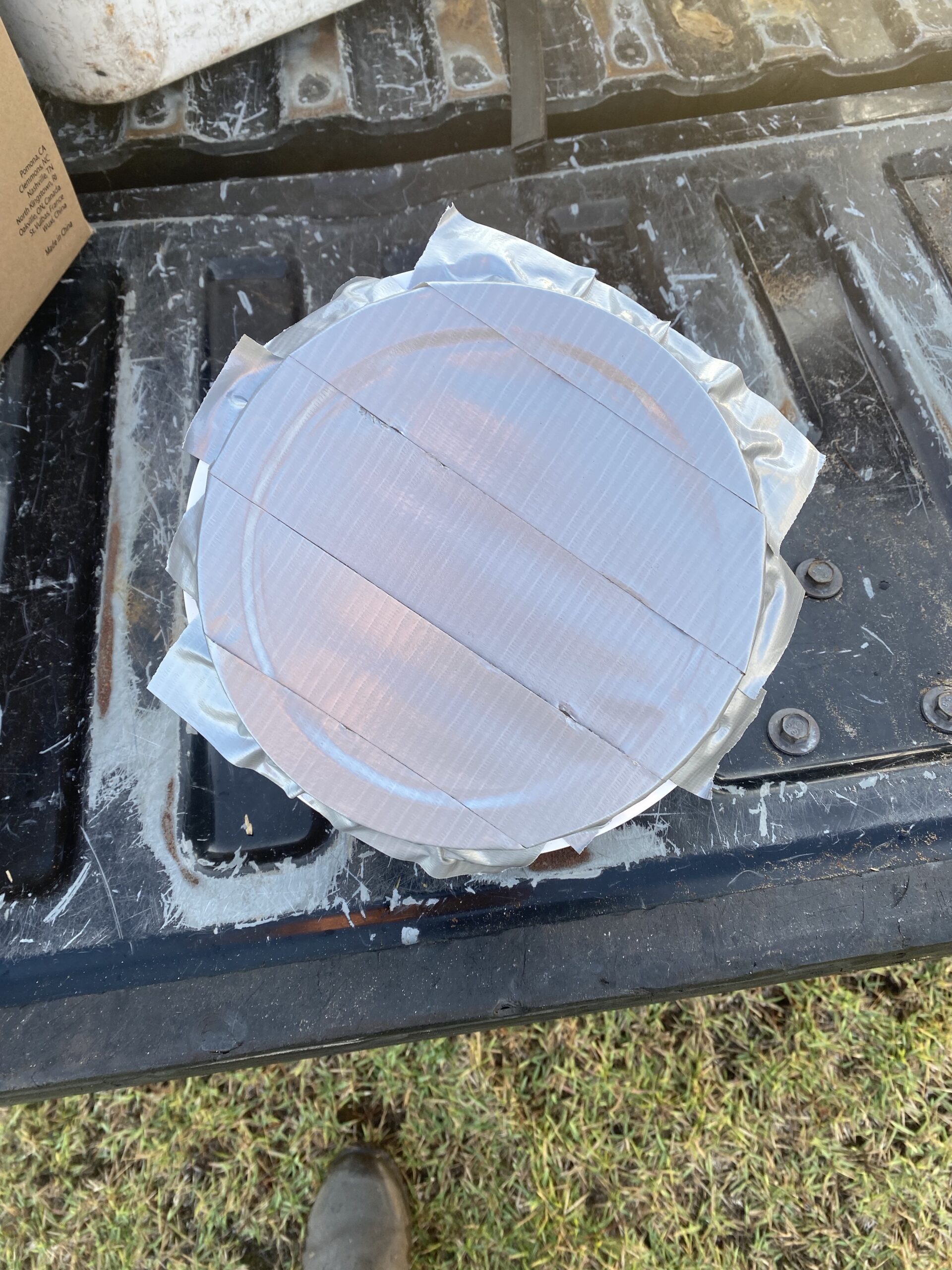 Tape the gasket in place