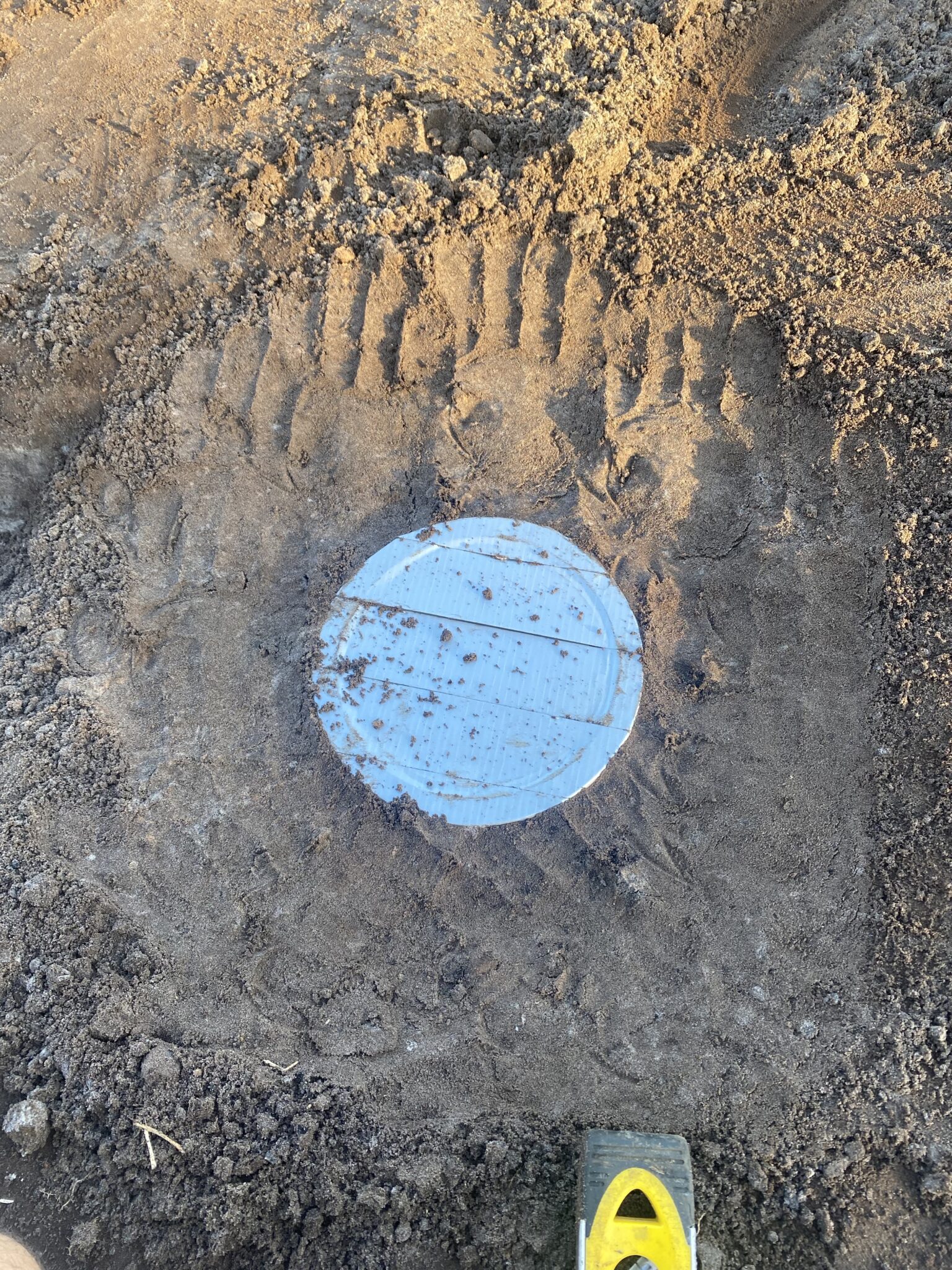 Now that you have found the center of the pool, it’s time to dig a hole ...