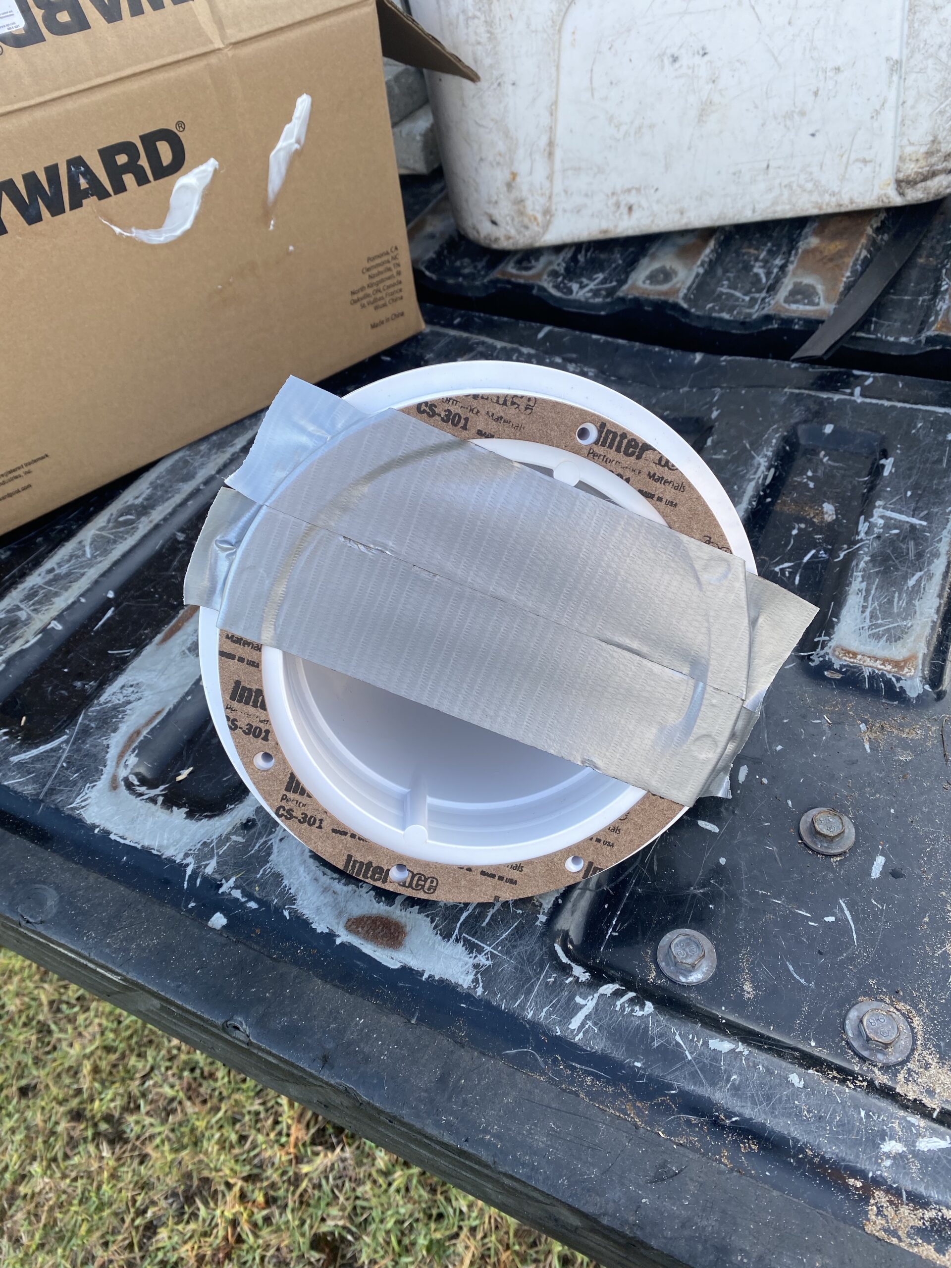 Tape the gasket in place