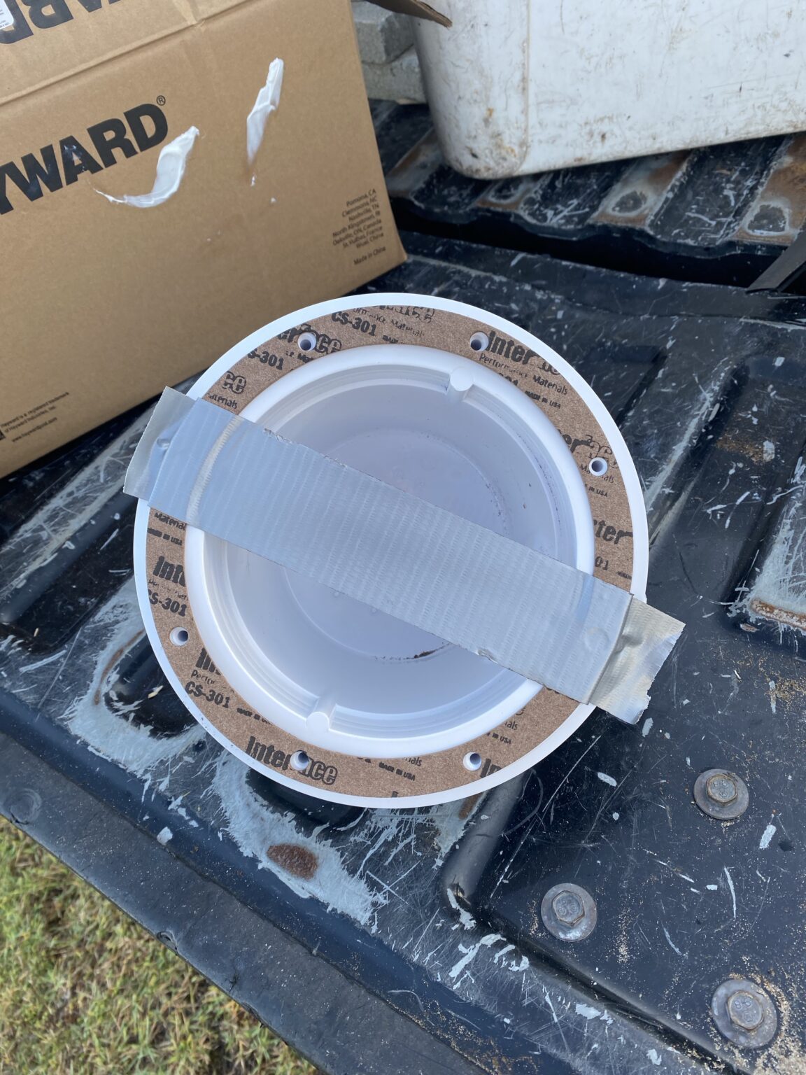 Tape the gasket in place