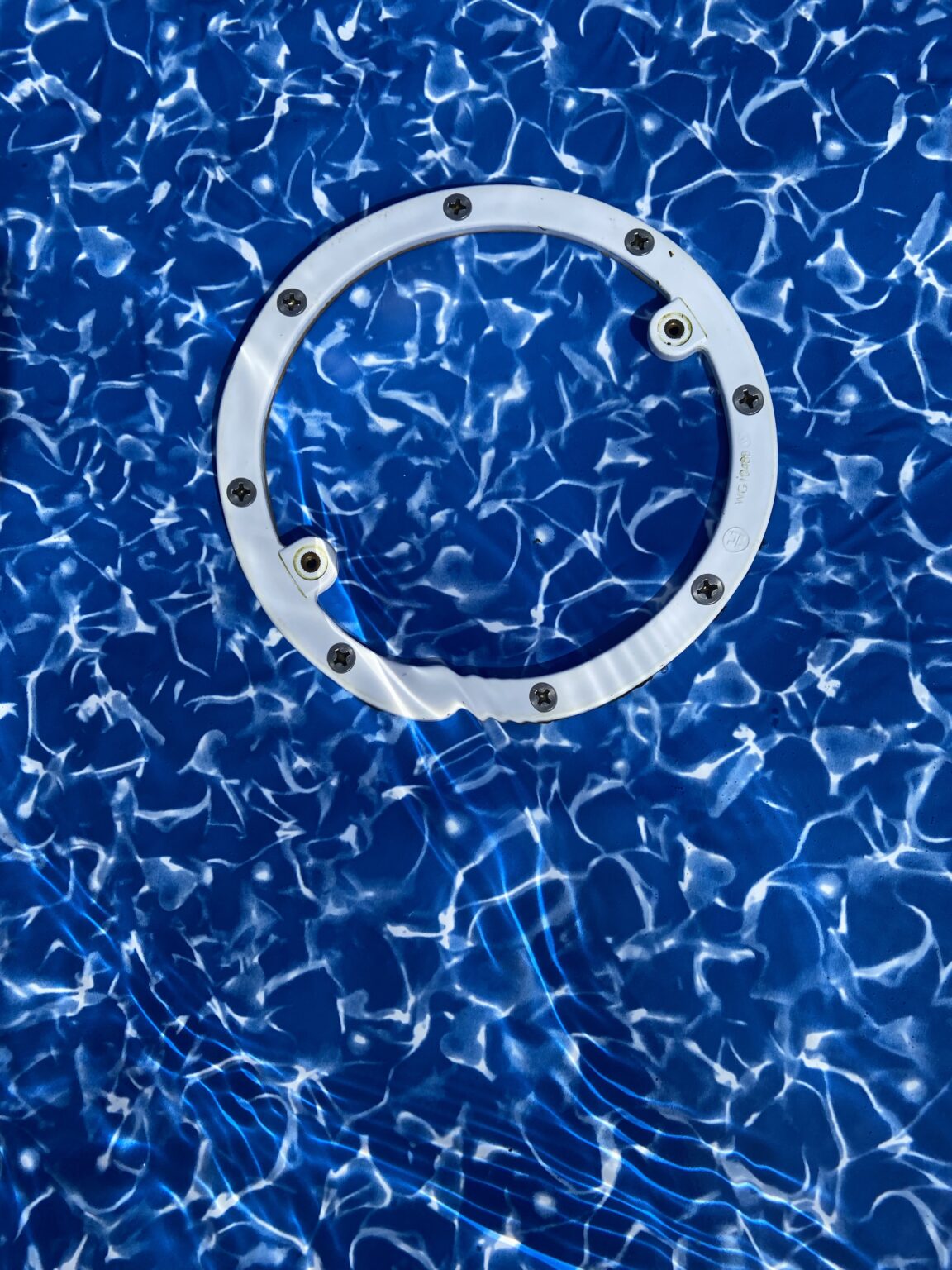 With all eight screws in their respective holes, you can now tighten ...